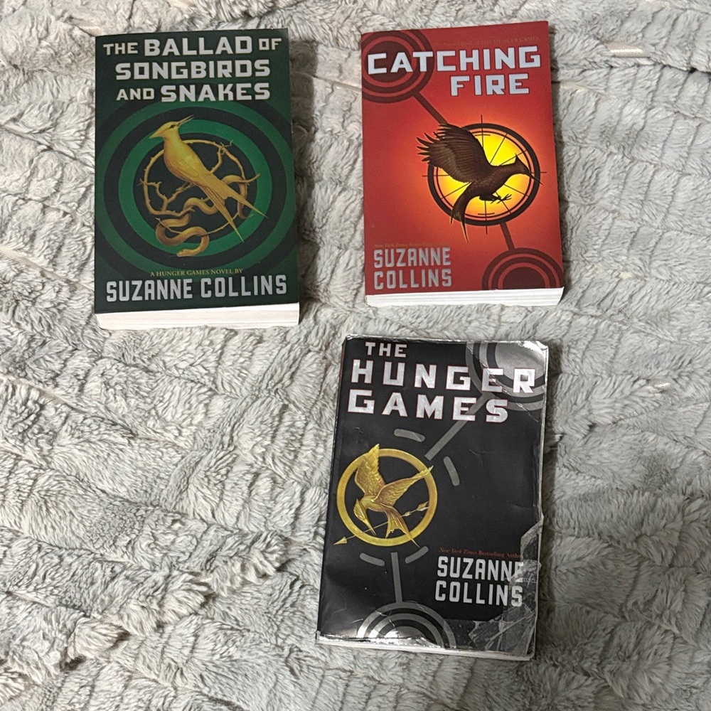 Scholastic The Hunger Games Trilogy - Green, Red, Bla… - Gem
